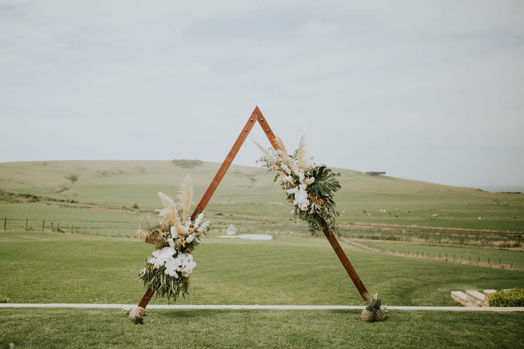 WOODEN TRIANGLE ARBOUR - The Wedding Creators