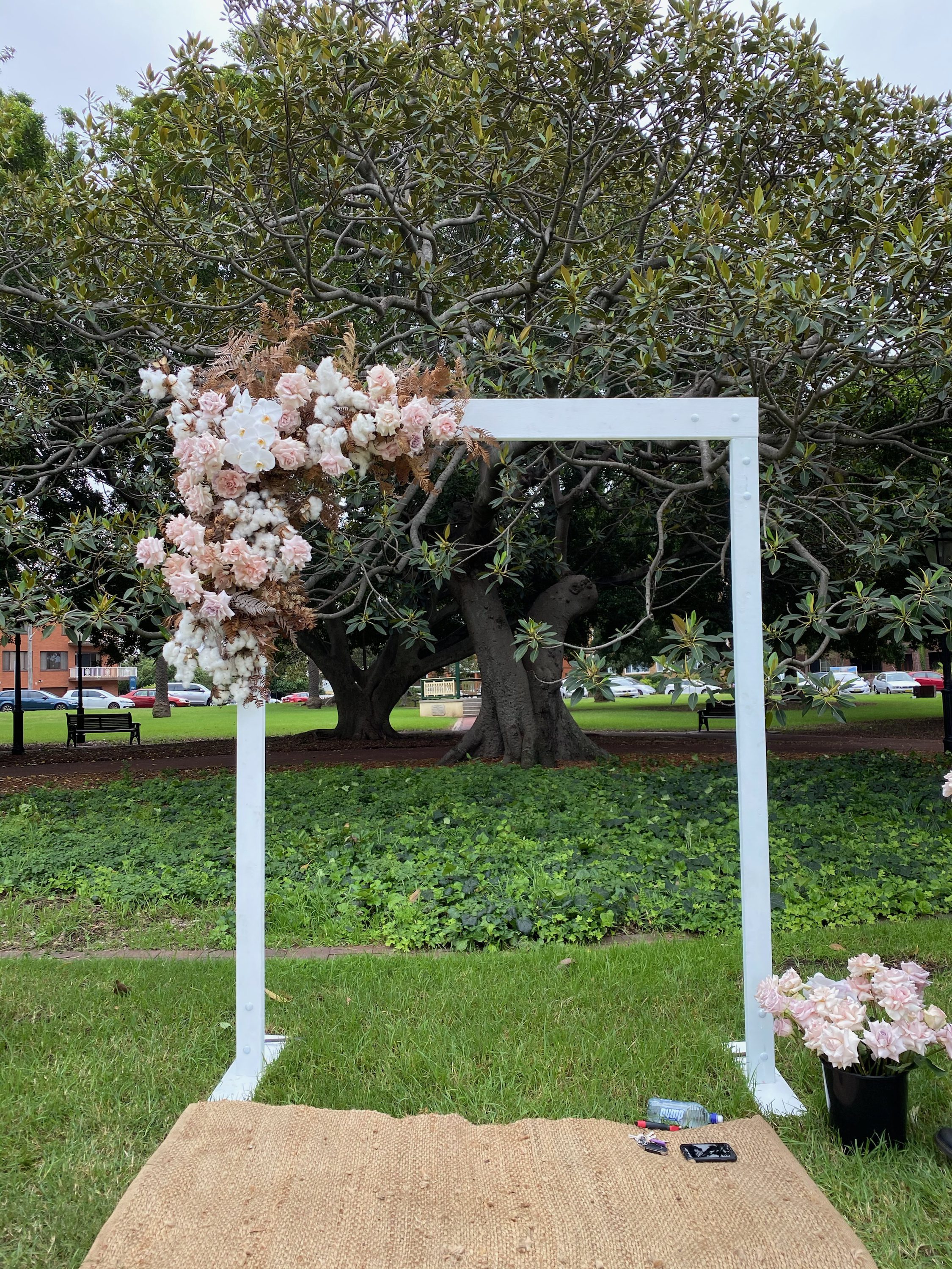 WHITE WOODEN ARBOUR – The Wedding + Event Creators